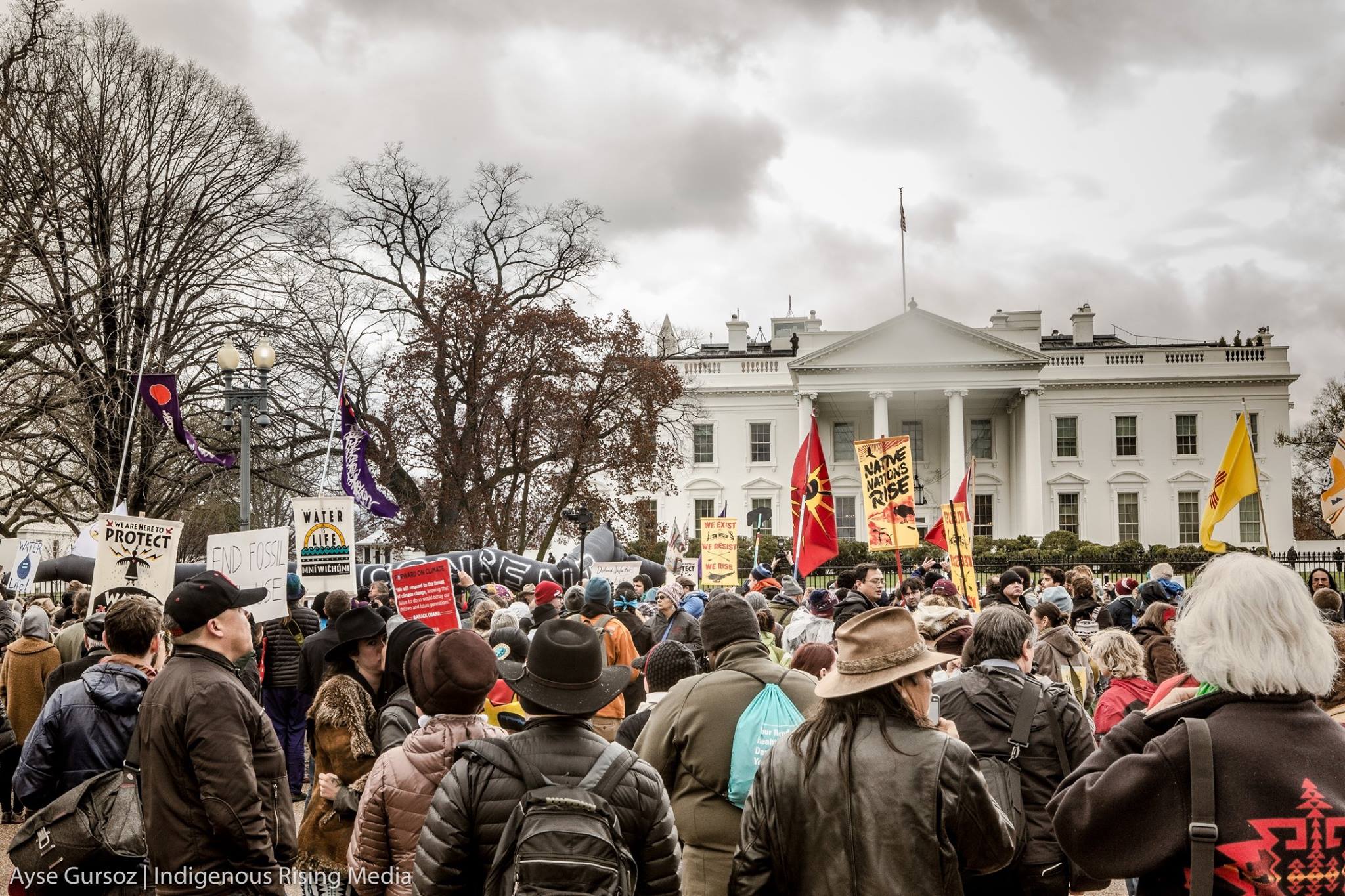 Activists and Native Americans march on Washington amid rain, sleet and ...