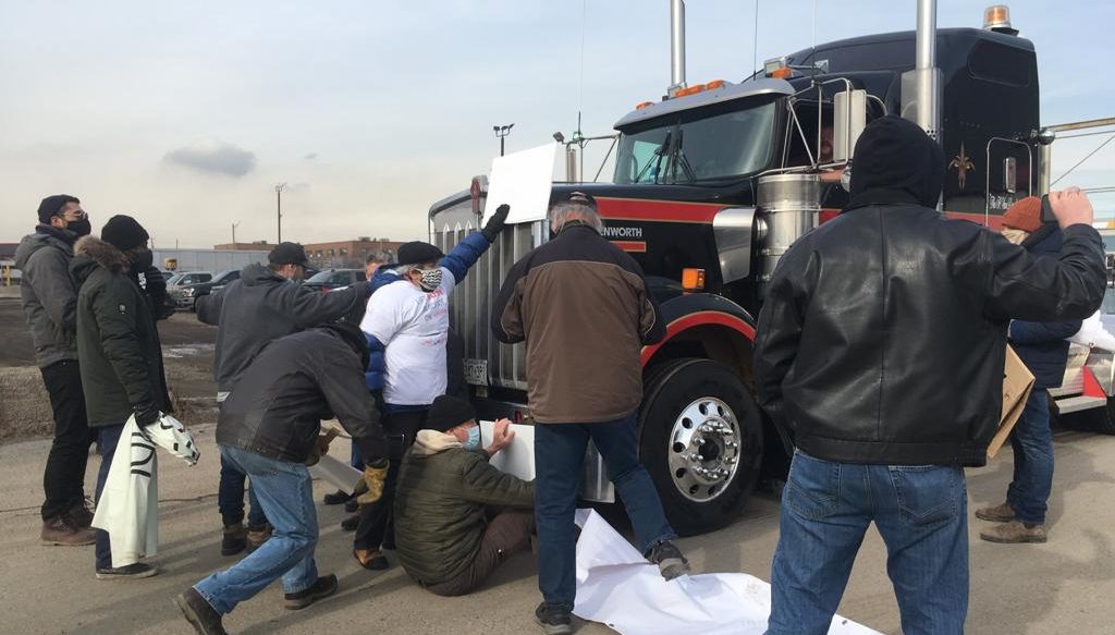 Activists block trucks at company transporting weapons to Saudi Arabia ...